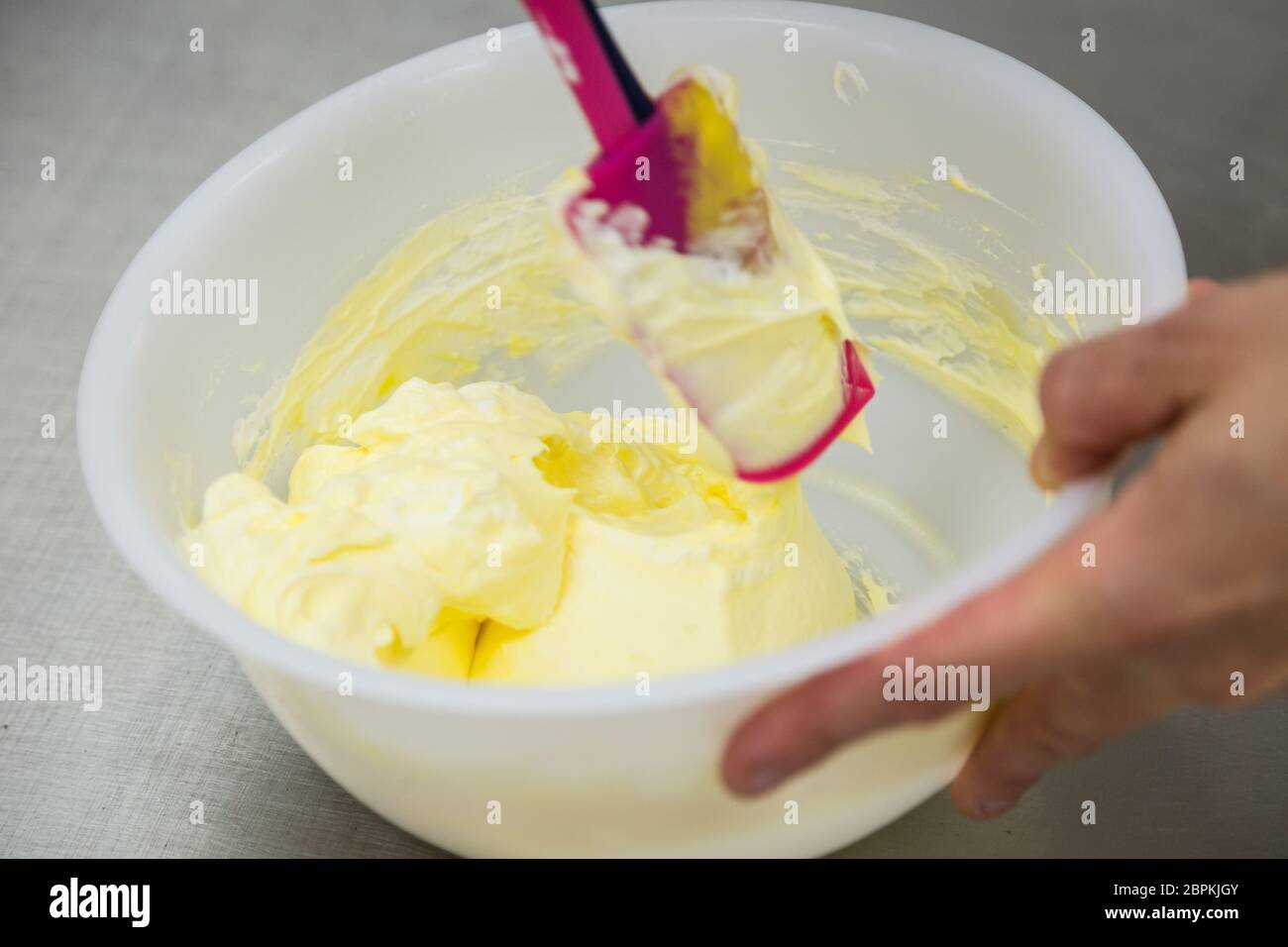 the preparation of the custard used for desserts Stock Photo - Alamy