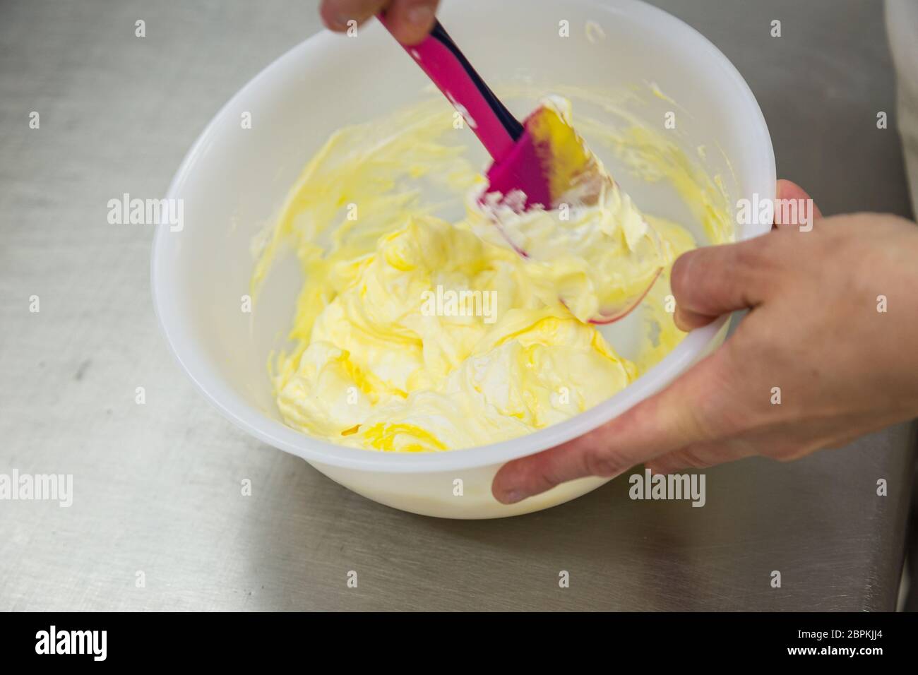 the preparation of the custard used for desserts Stock Photo - Alamy