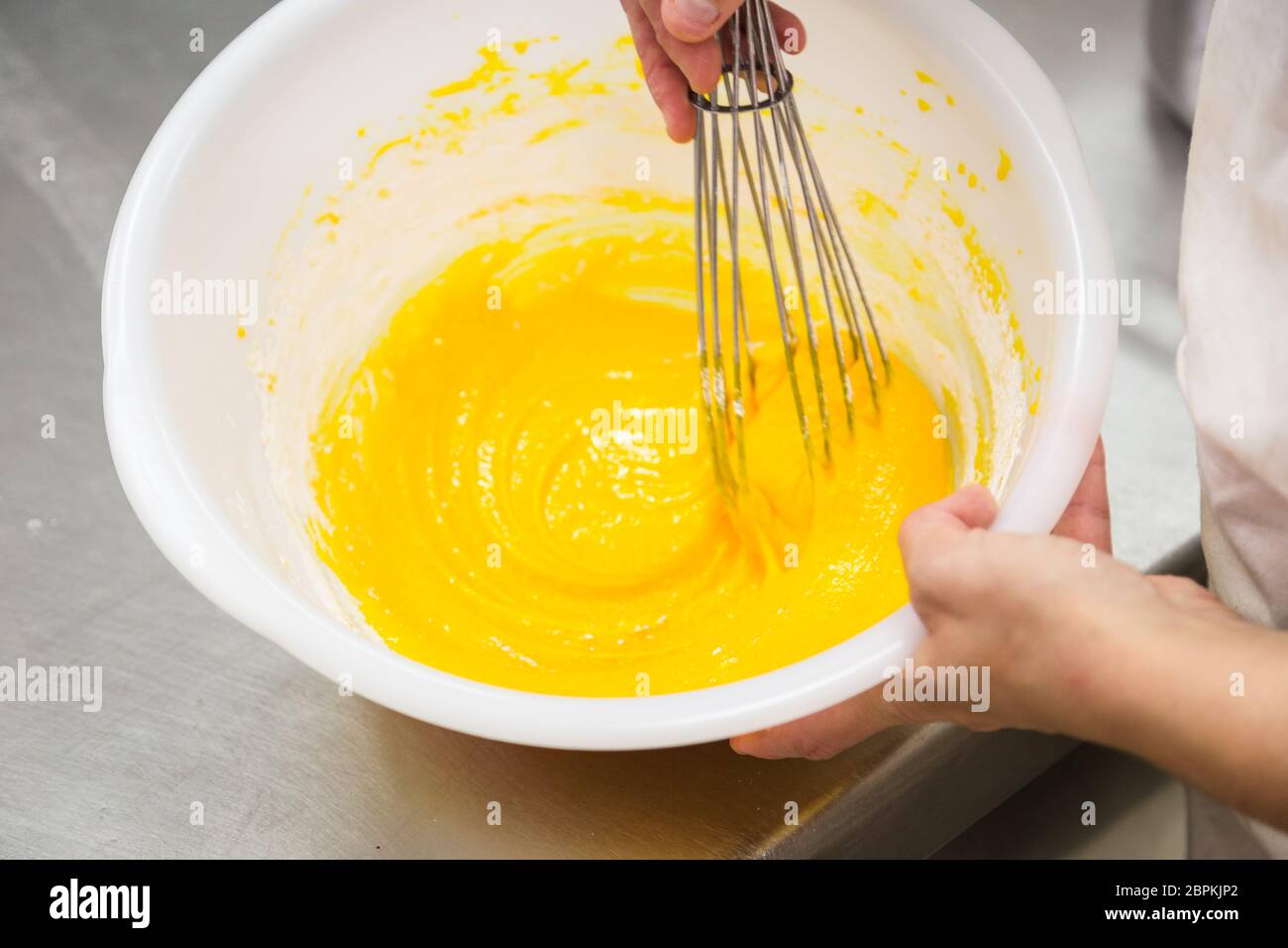 the preparation of the custard used for desserts Stock Photo - Alamy