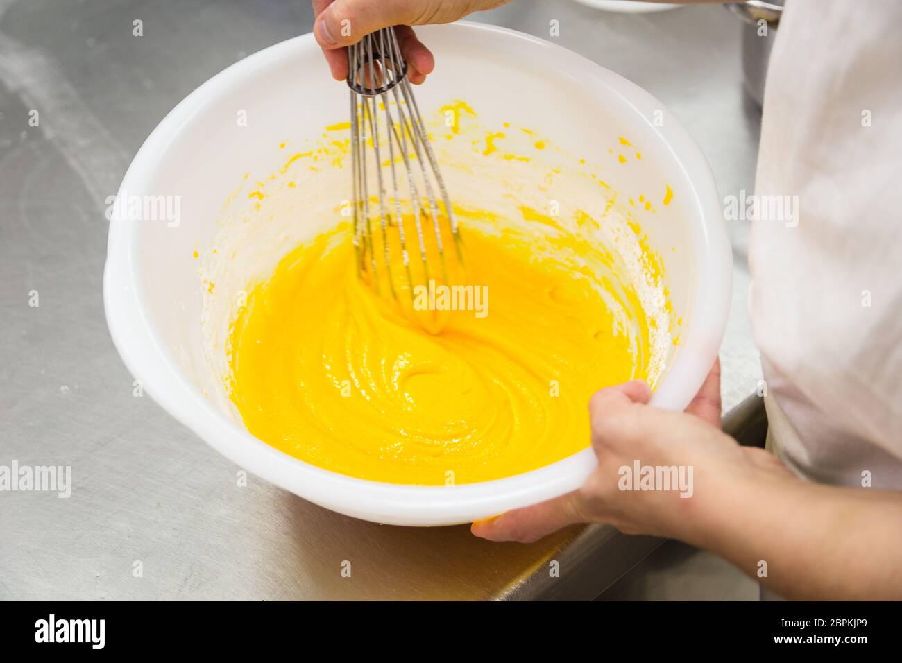 the preparation of the custard used for desserts Stock Photo - Alamy