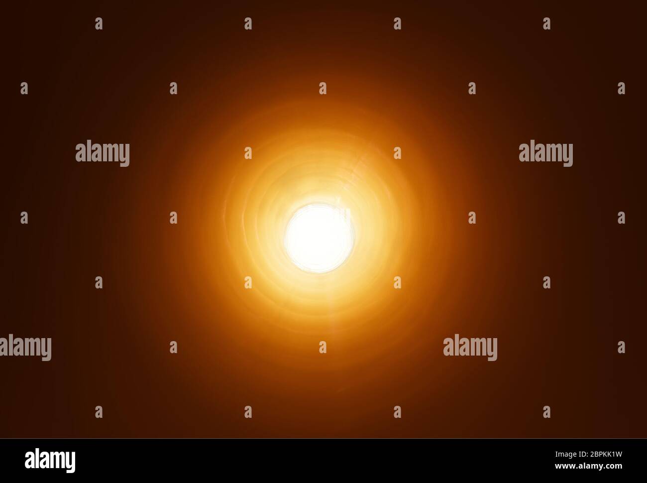 Glowing lamp on ceiling background Stock Photo - Alamy