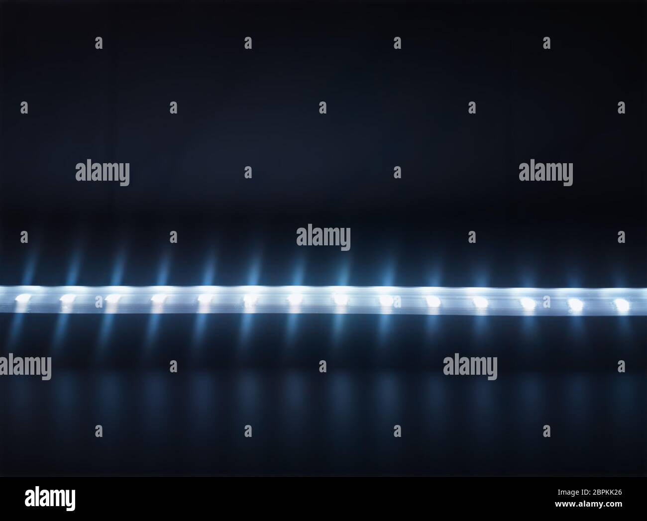 Line of blue led lamps background Stock Photo - Alamy