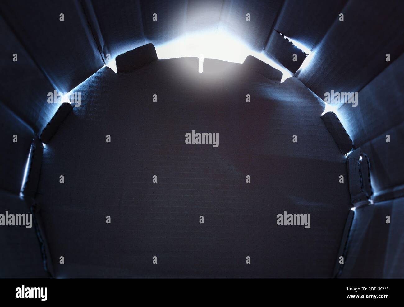 Light glowing through slits of cardboard box background Stock Photo - Alamy