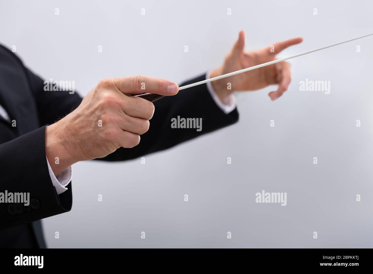 Holding baton hi-res stock photography and images - Alamy