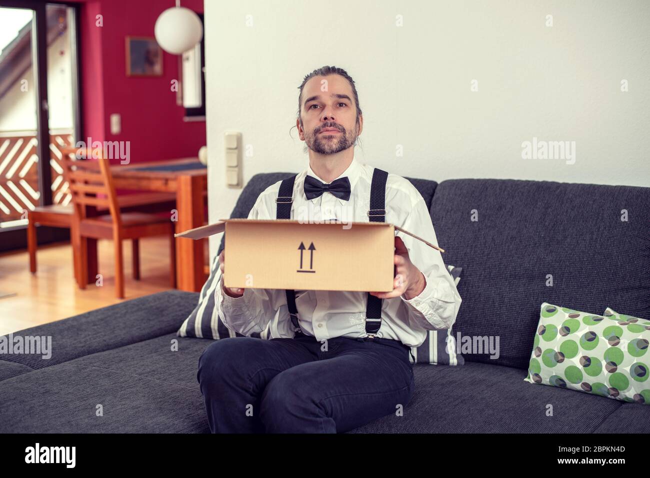 Opening a package hi-res stock photography and images - Alamy