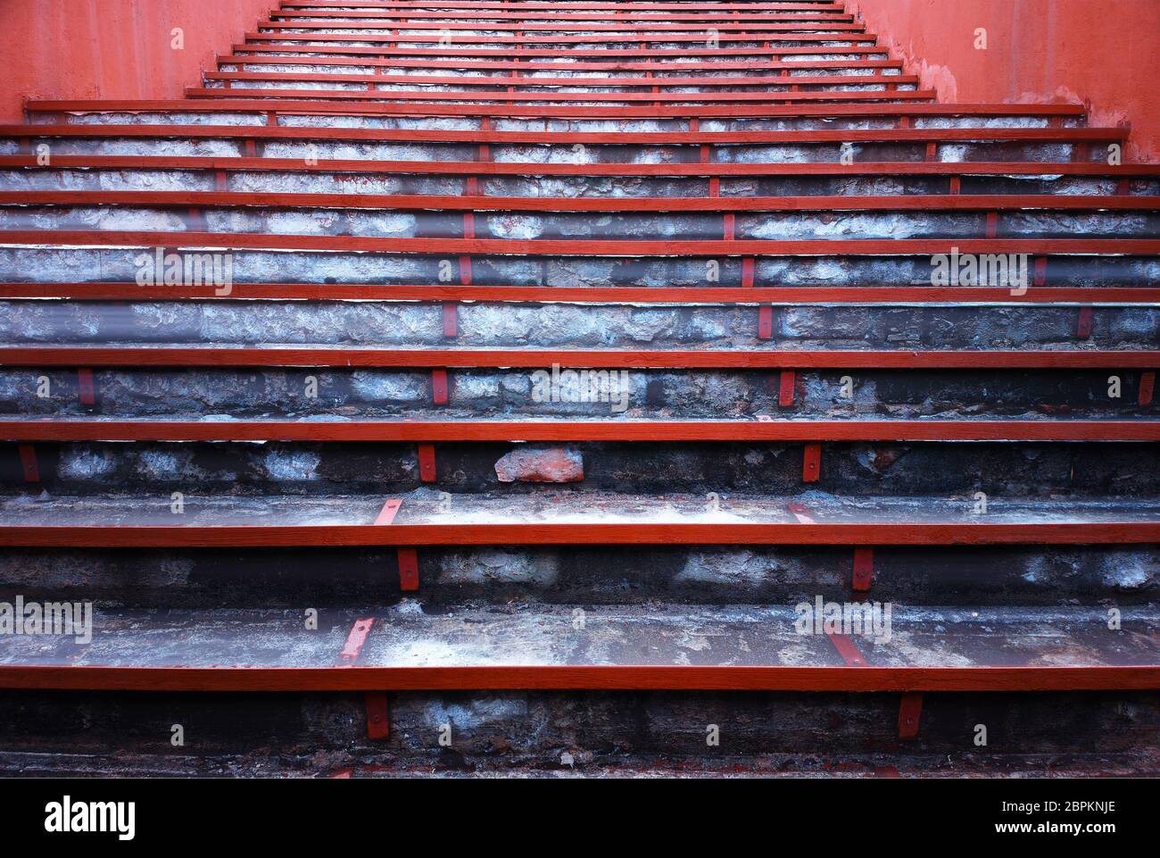 Abandoned red upstairs object background Stock Photo - Alamy