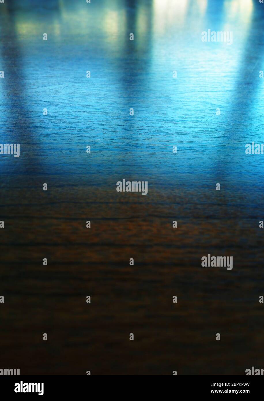 Dramatic reflections on the office table surface Stock Photo - Alamy