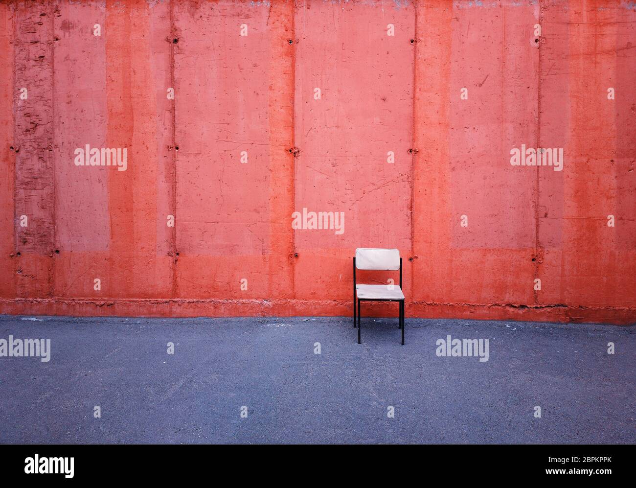 Minimalistic chair in the middle of grunge street background Stock ...