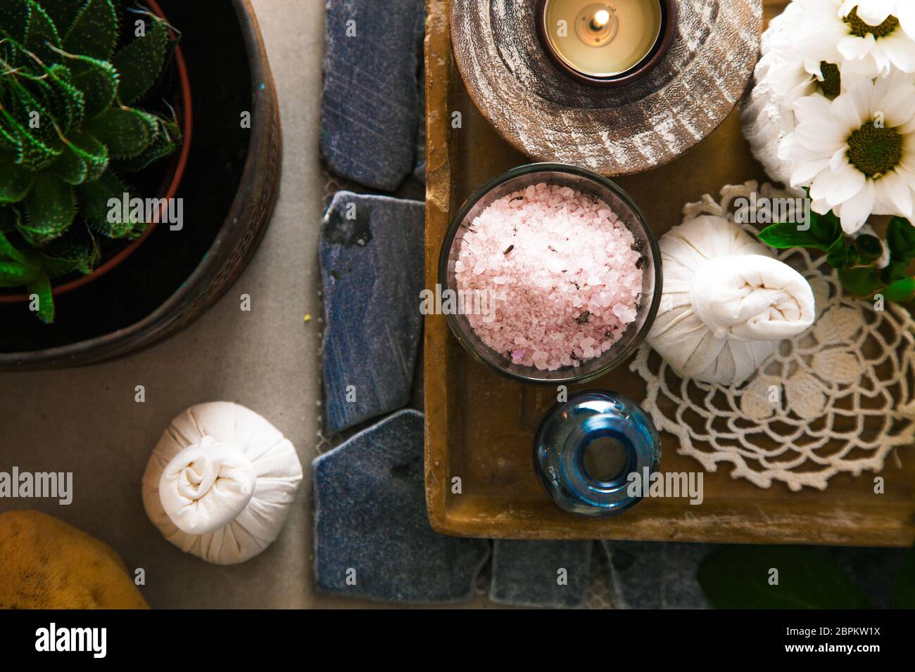 Spa and wellness. Spa products in natural setting Overhead flatlay of ...