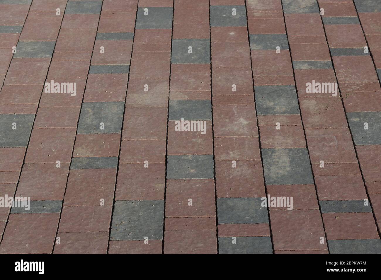 Making of new sidewalk from red brick pavement Stock Photo - Alamy