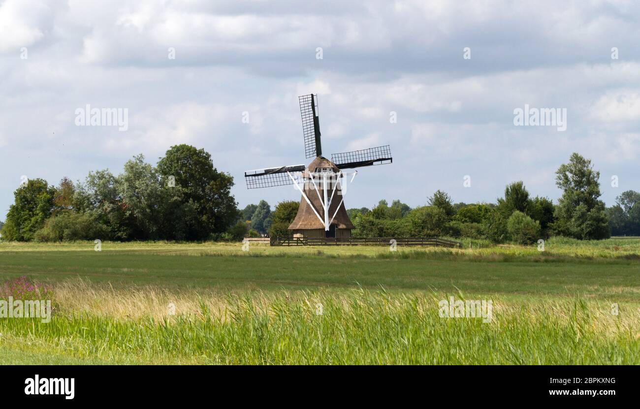 Old windmill in Holland, the Netherlands in the olden days Stock Photo ...