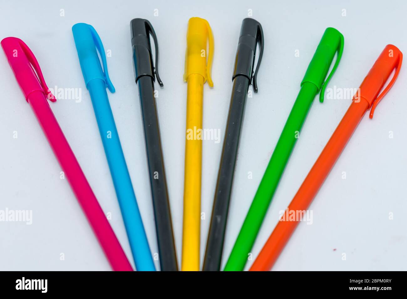 Set of multi-colored pens, tools for writing drawing, isolated on white ...