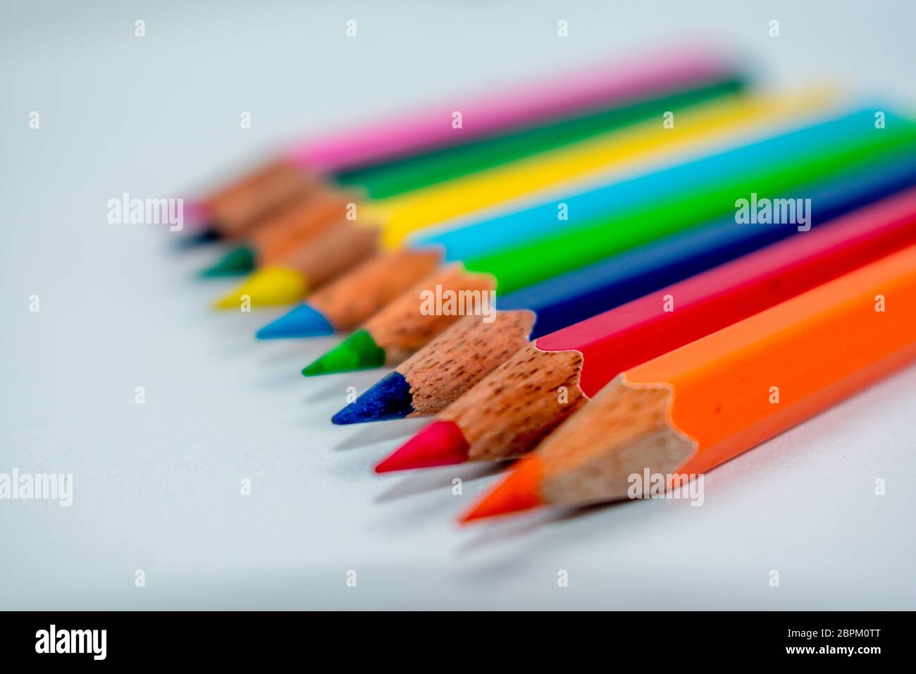 Pencils lined up in shallow focus. Color pencils isolated on white ...