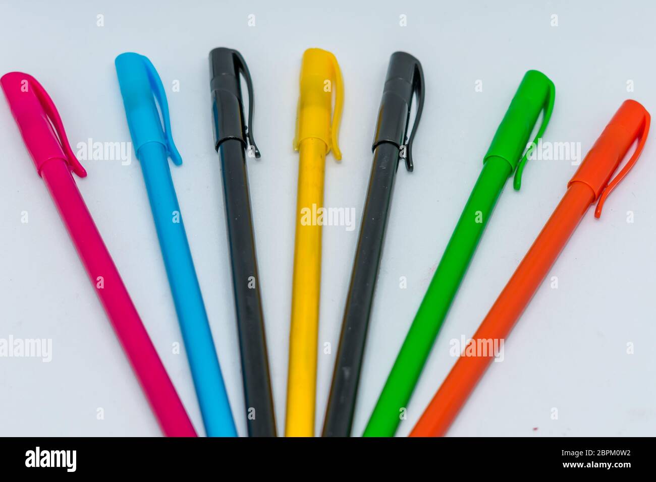 Set of multi-colored pens, tools for writing drawing, isolated on white ...