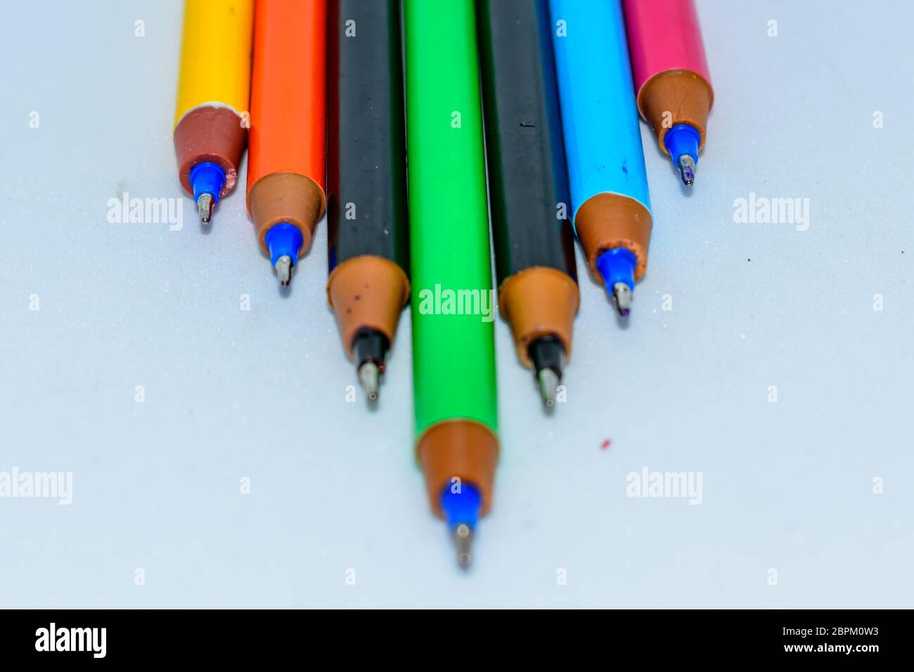 Set of multi-colored pens, tools for writing drawing, isolated on white ...