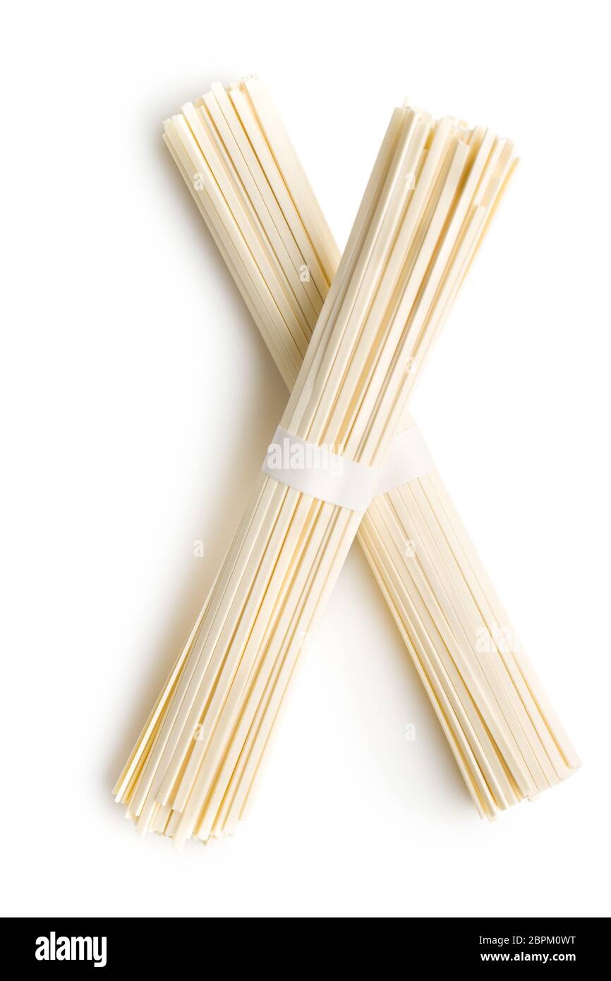 Raw udon noodles isolated on white background Stock Photo - Alamy