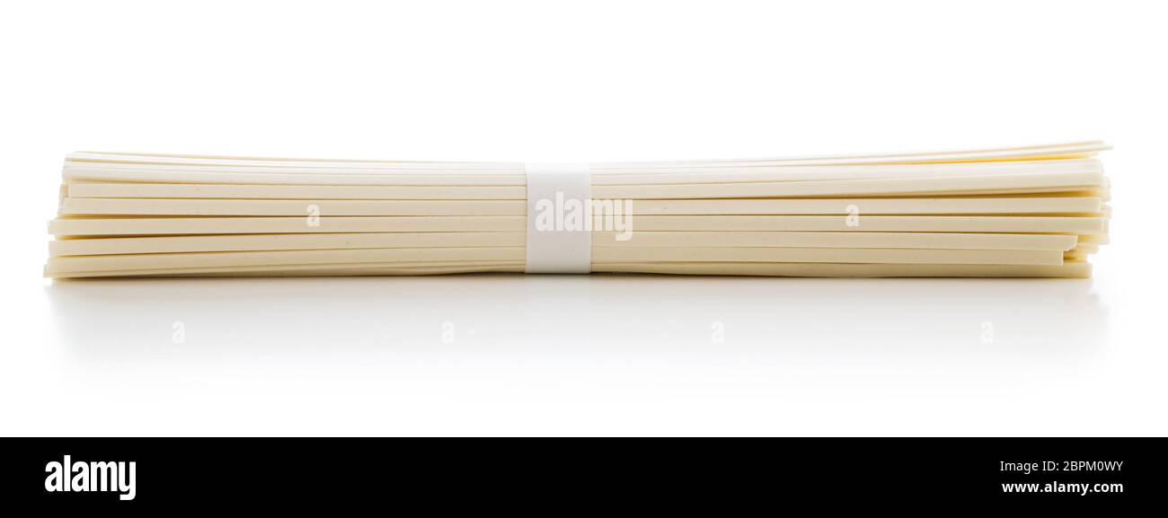 Raw udon noodles isolated on white background Stock Photo - Alamy