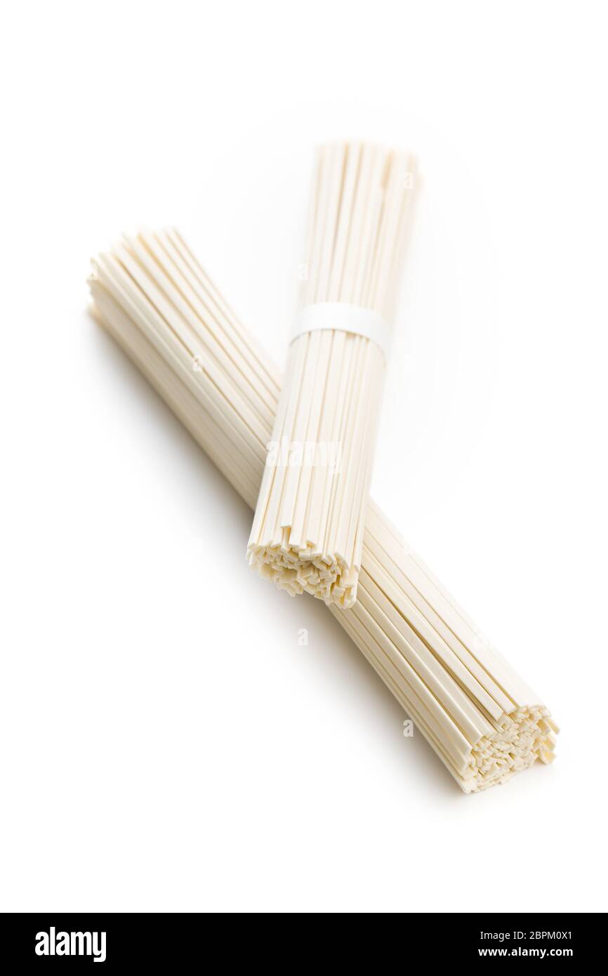 Raw udon noodles isolated on white background Stock Photo - Alamy