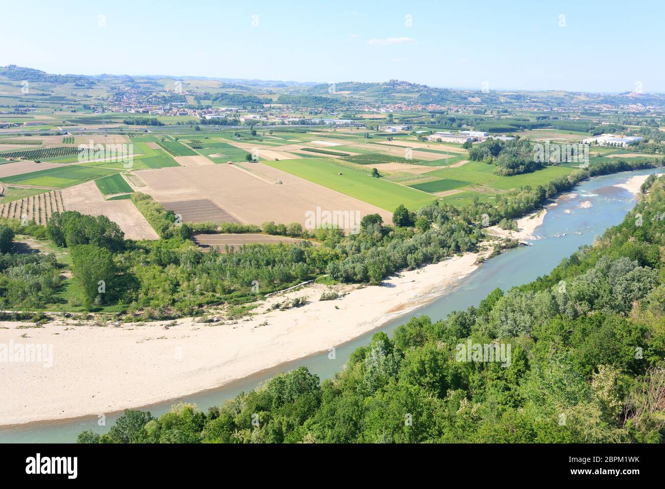 Tanaro river view. Vineyards from Langhe region,Italy agriculture ...