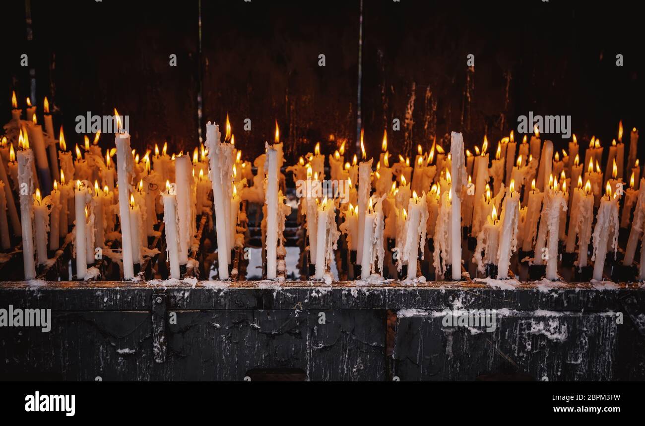 Lighting advent candle church hi-res stock photography and images - Alamy