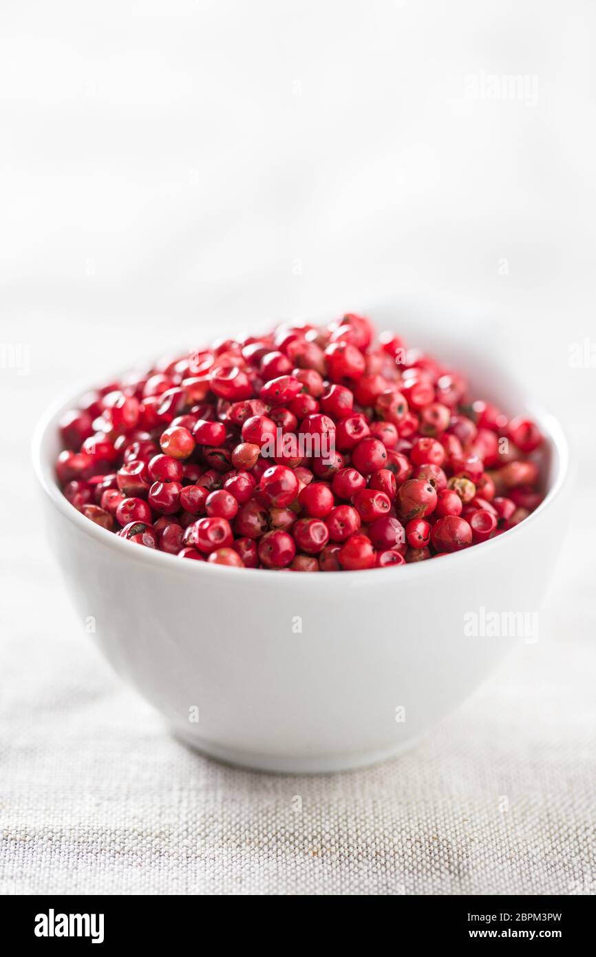 Pink peppercorn in bowl hi-res stock photography and images - Alamy