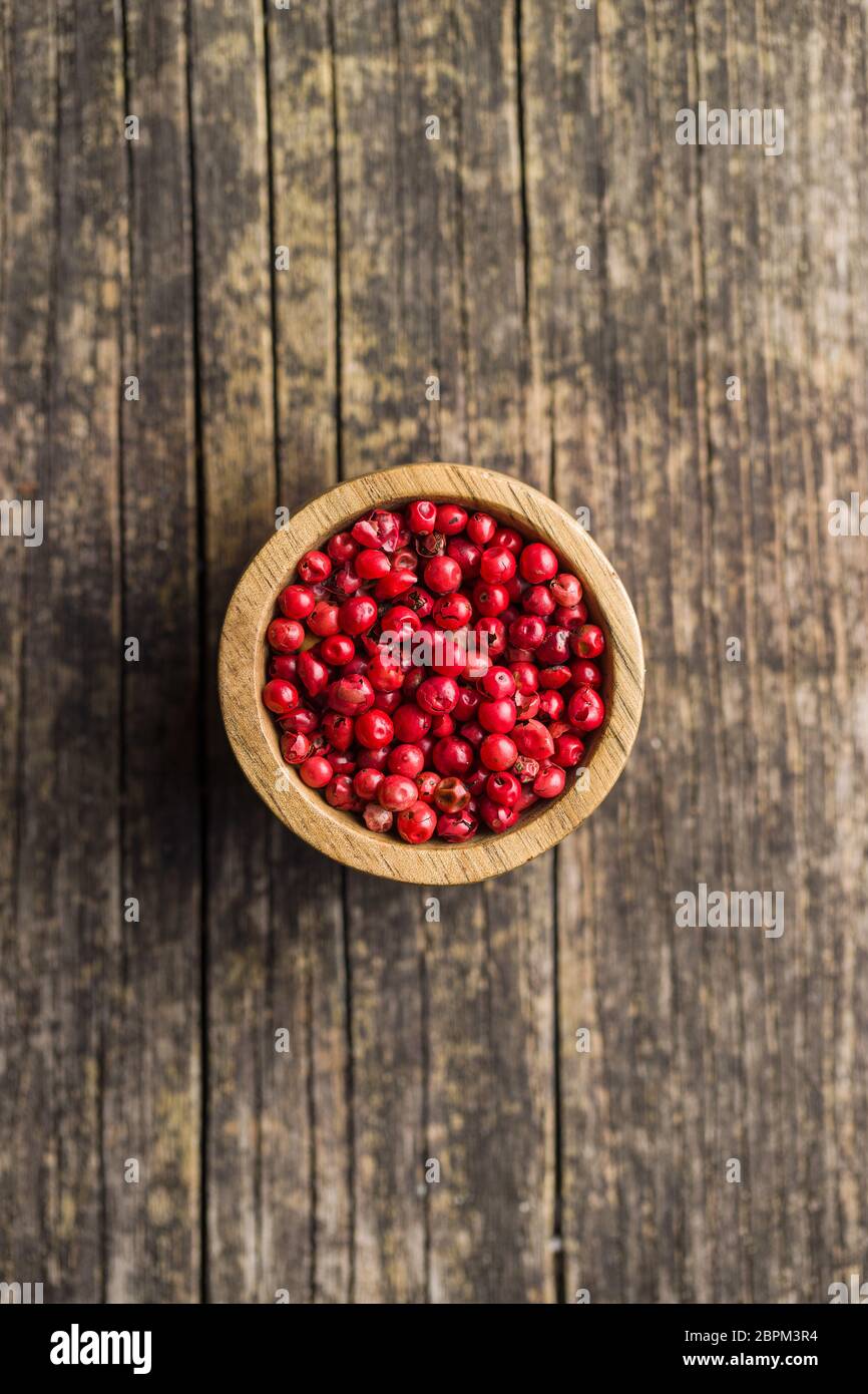 Pink peppercorn in bowl hi-res stock photography and images - Alamy