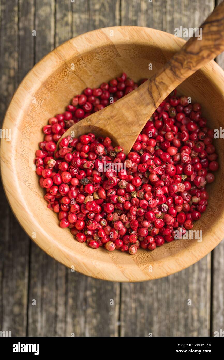 Pink peppercorn in bowl hi-res stock photography and images - Alamy