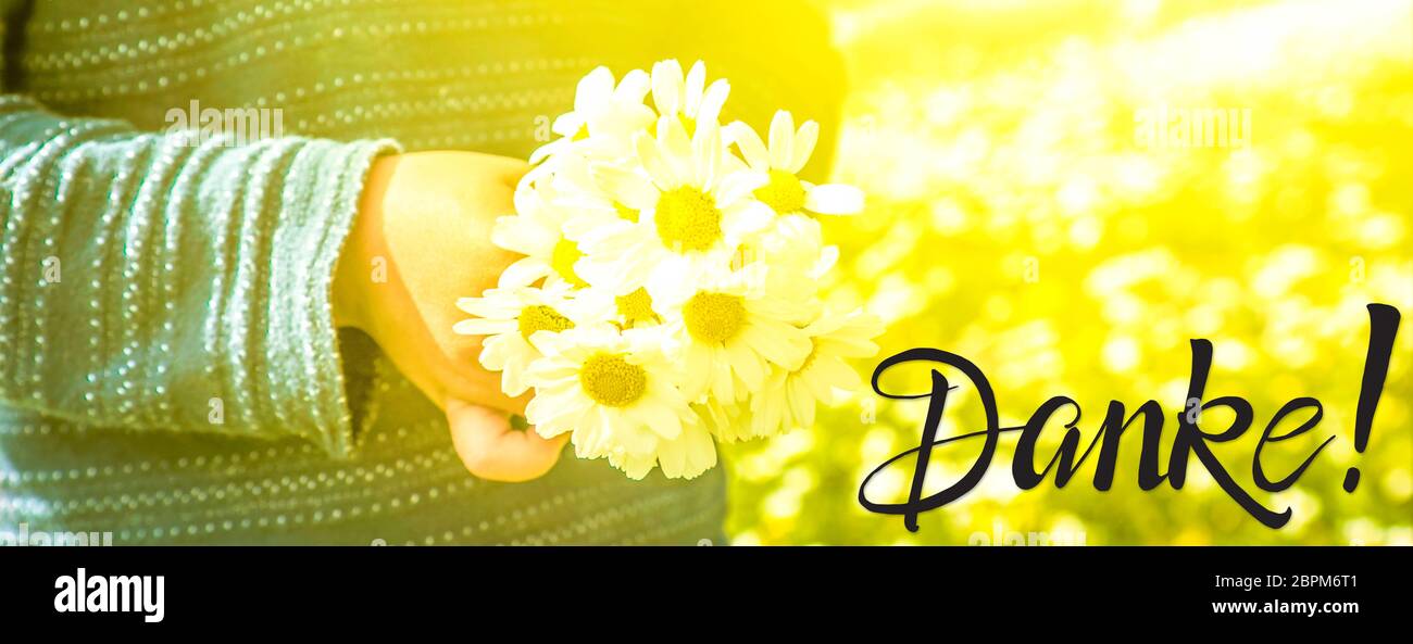 German Calligraphy Danke Means Thank You. Cute Little Kid Is Holding A ...