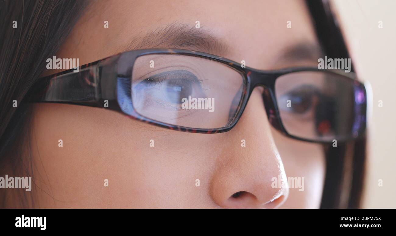 Woman look at the computer screen Stock Photo - Alamy