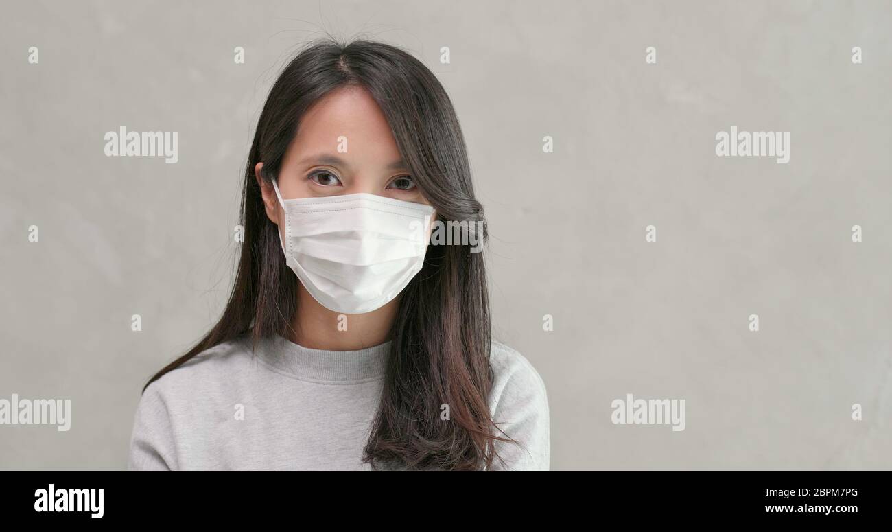 Woman wearing face mask fro protection Stock Photo - Alamy