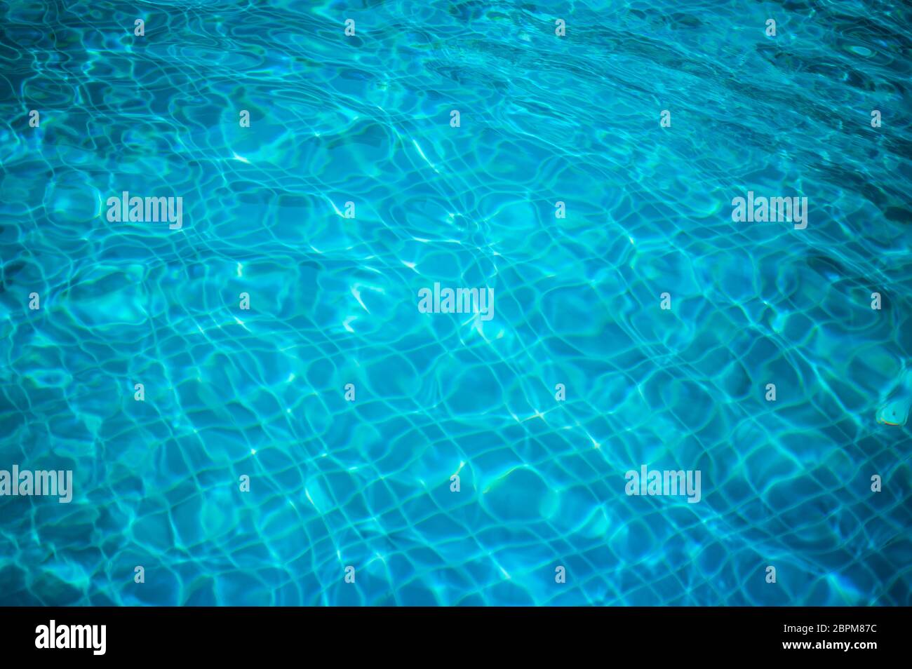 Bright refreshing aquamarine blue swimming pool water background Stock ...