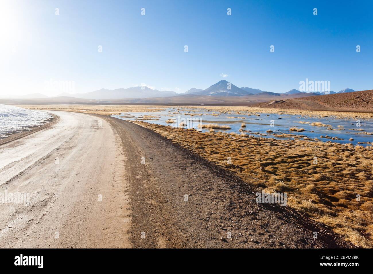 Chilean landscape, dirt road and Licancabur volcano. Chile panorama ...