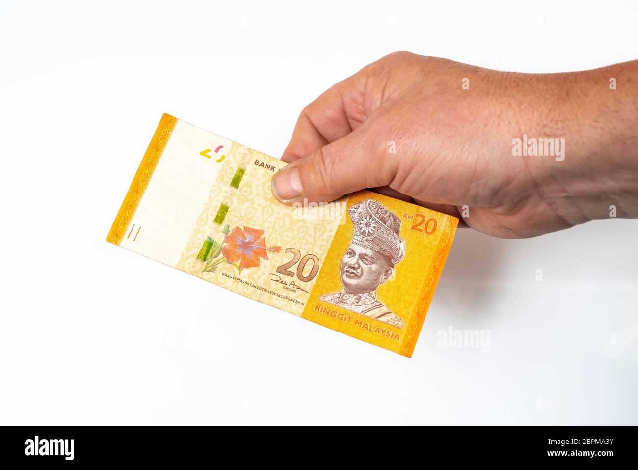 a 20 Malaysian Ringgit banknote on a white surface Stock Photo - Alamy