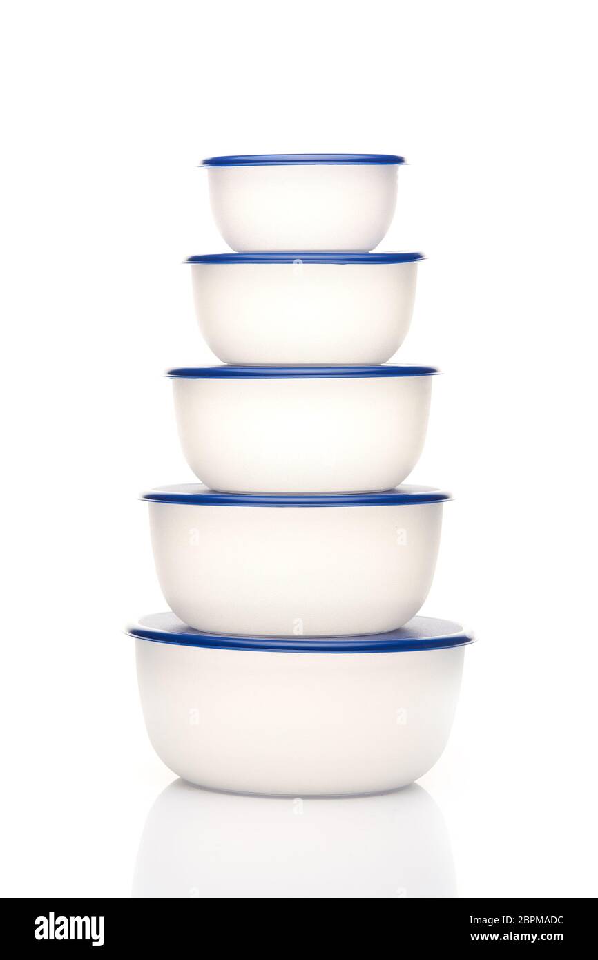 Pile of empty transparent plastic containers for food on a white ...