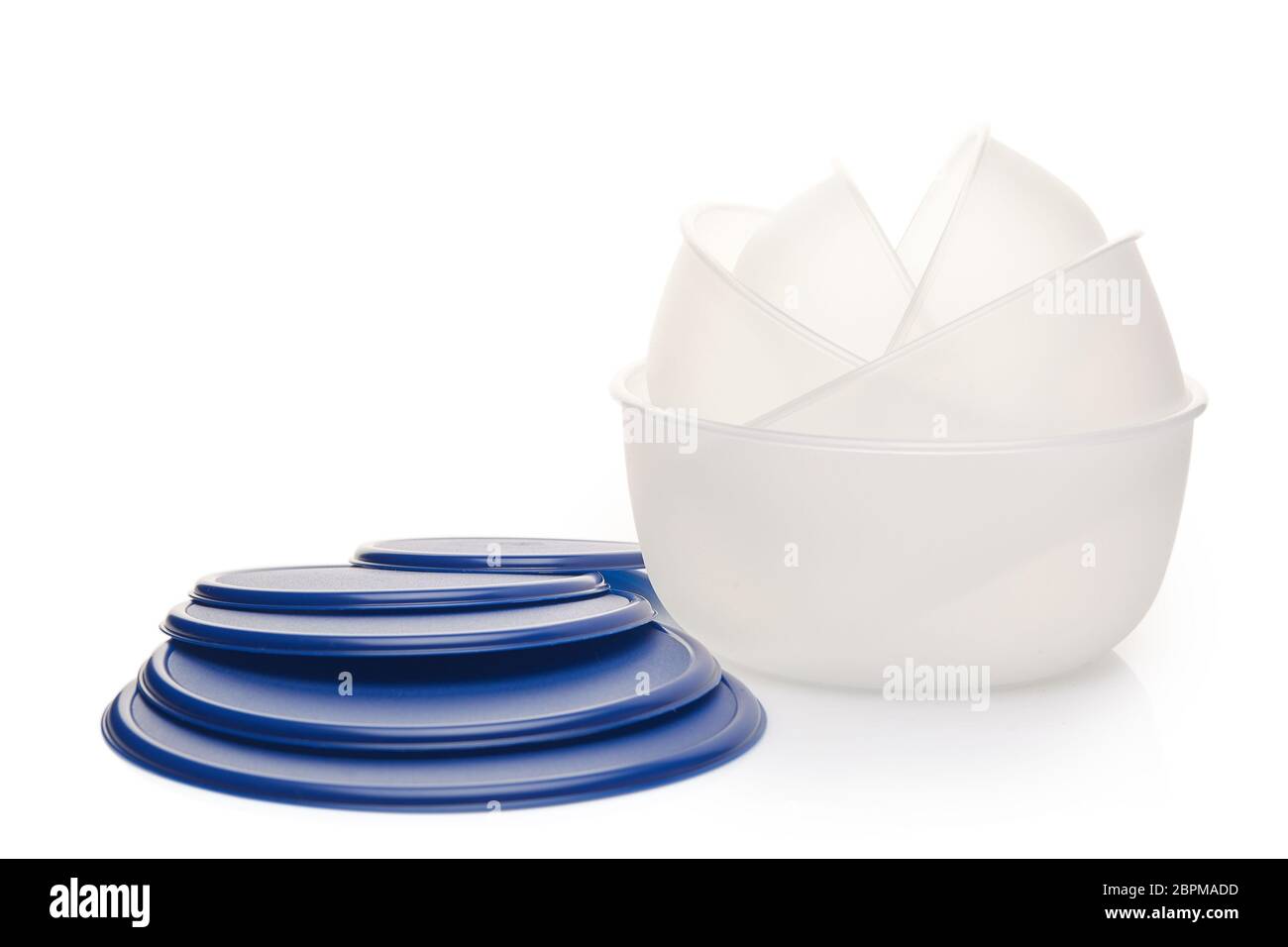 Pile of empty transparent plastic containers for food on a white ...