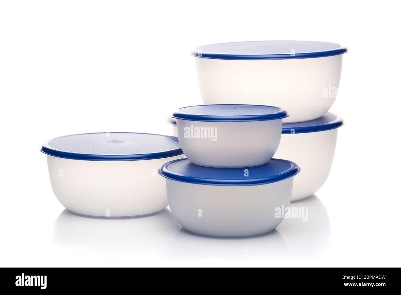 Pile of empty transparent plastic containers for food on a white ...