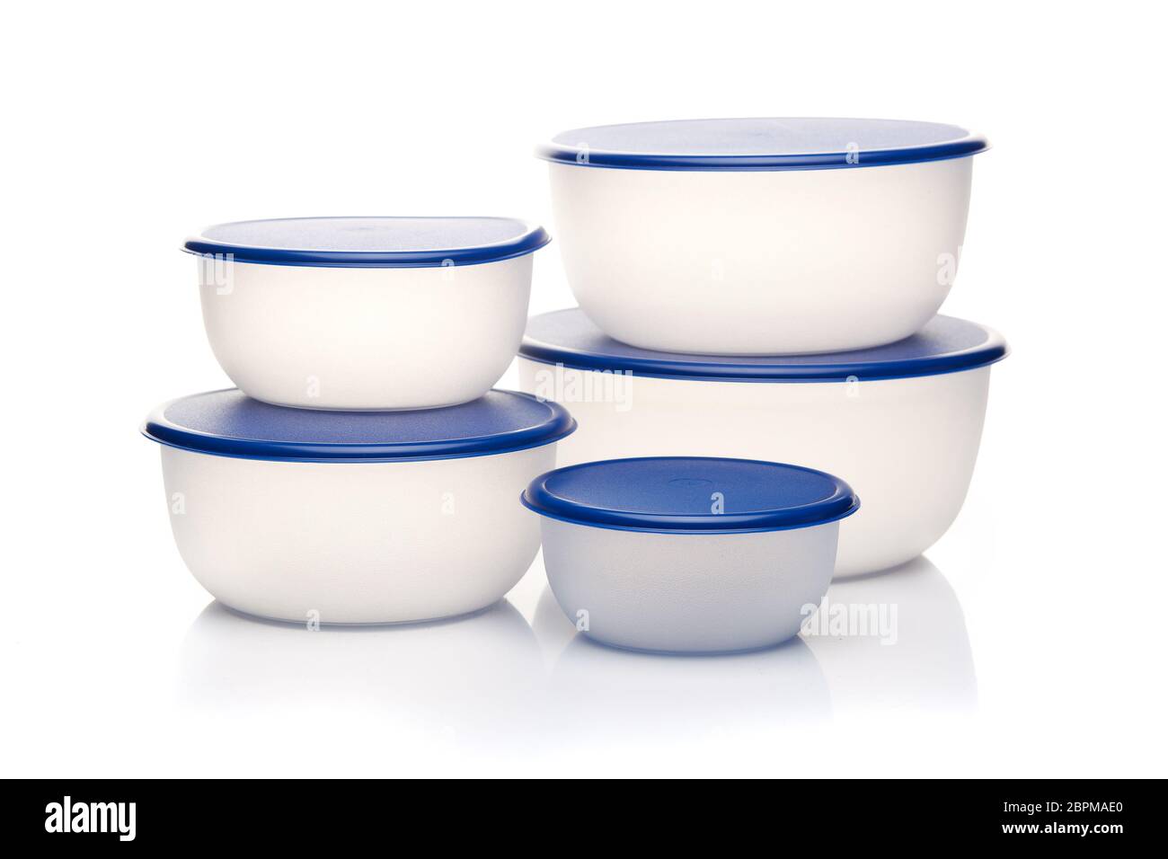 Pile of empty transparent plastic containers for food on a white ...