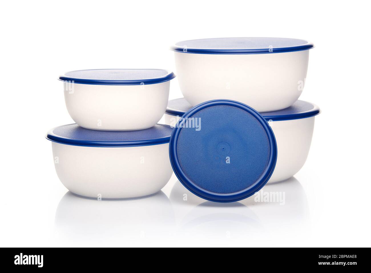 Pile of empty transparent plastic containers for food on a white ...