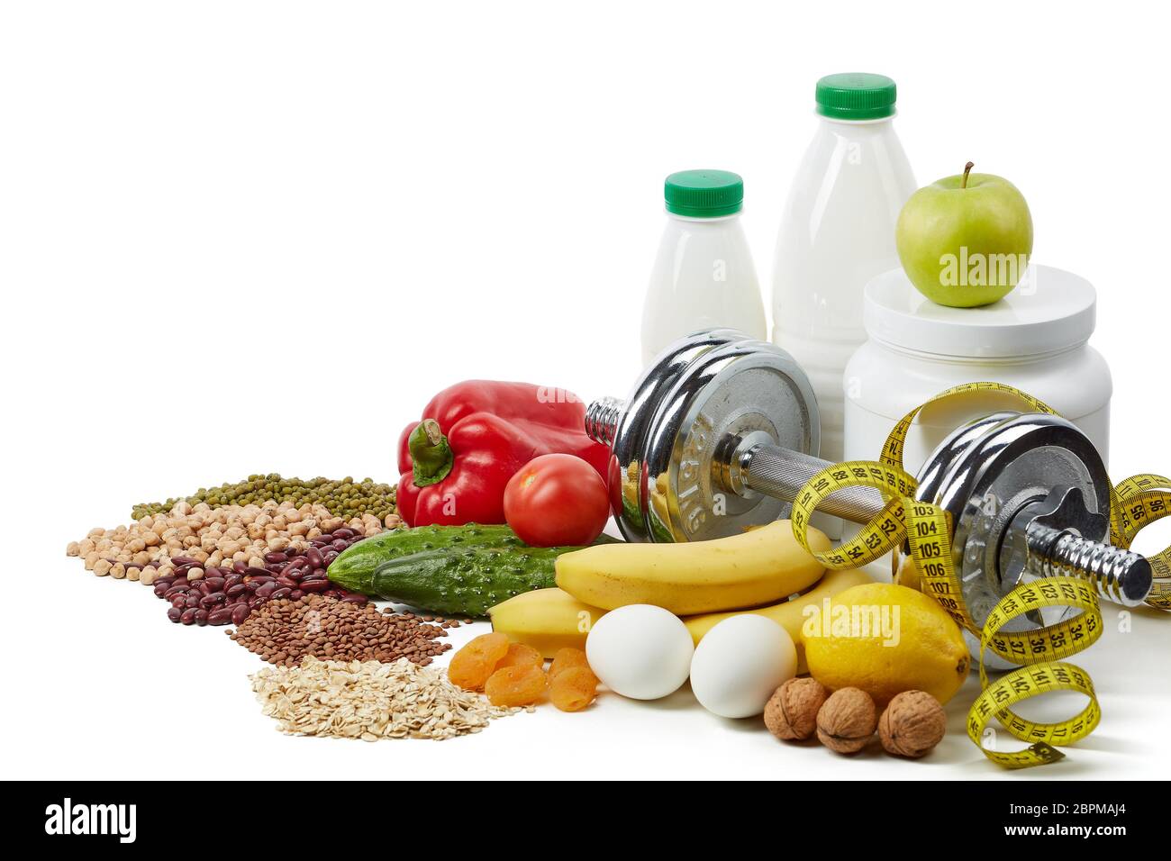 Sports nutrition (supplements), healthy food and dumbbells isolated on ...