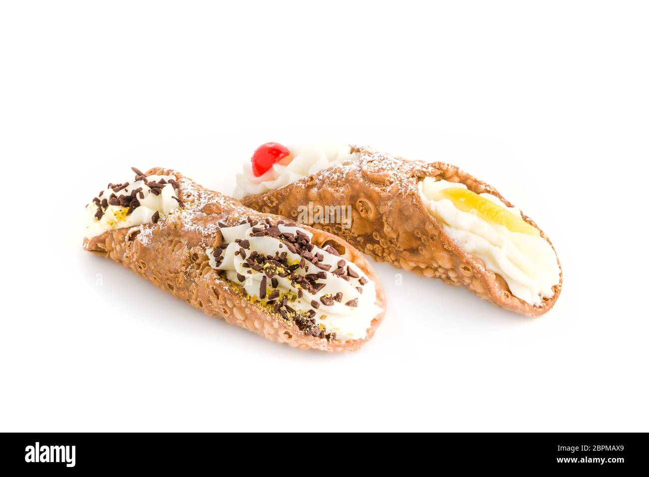 Two cannoli pastries. Traditional Sicilian dessert, filled with a rich ...