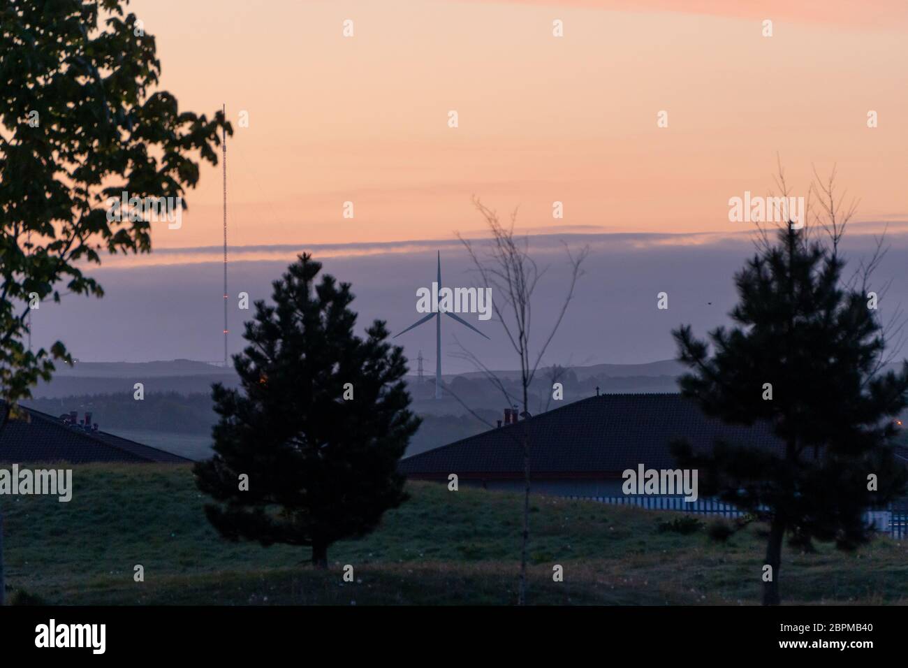 Wind turbine among the bushes Stock Photo - Alamy