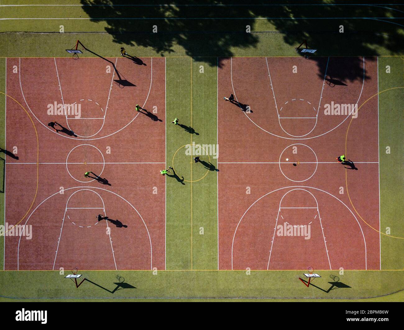 Aerial view of a soccer pitch with people playing soccer on it - in ...