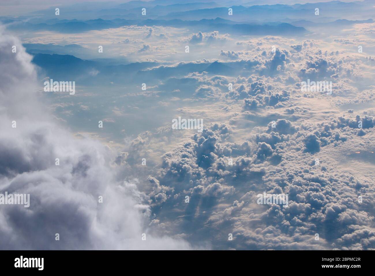 Flight above clouds. Panorama from window of plane with white clouds ...