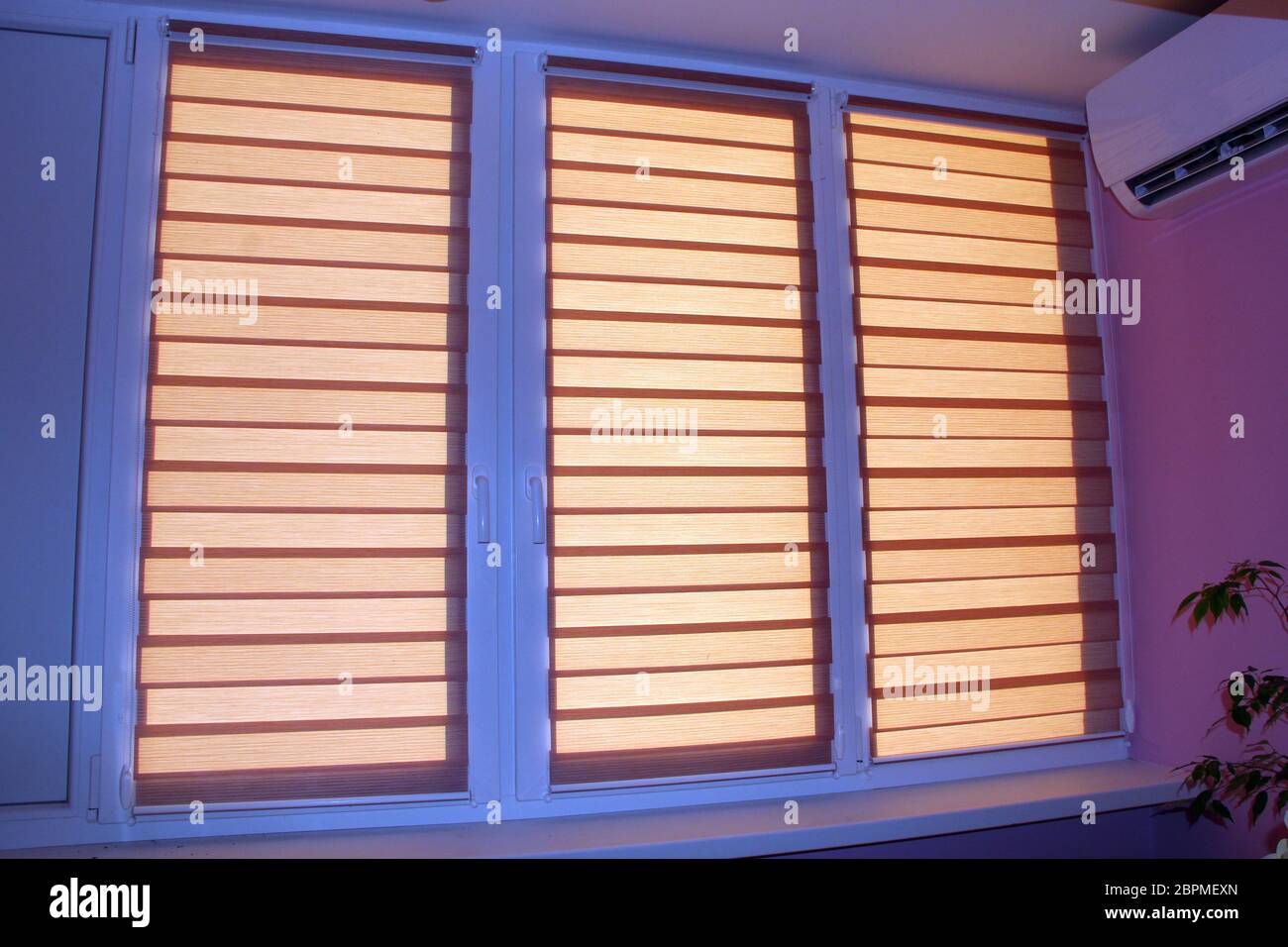 Modern jalousie system day and night on window in cozy room. Blinds in ...
