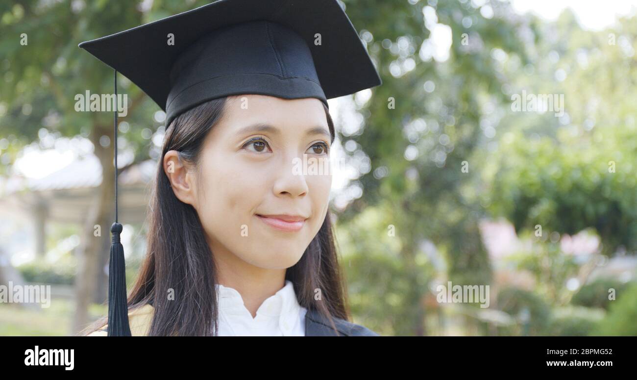 Woman wear graduation gown Stock Photo - Alamy