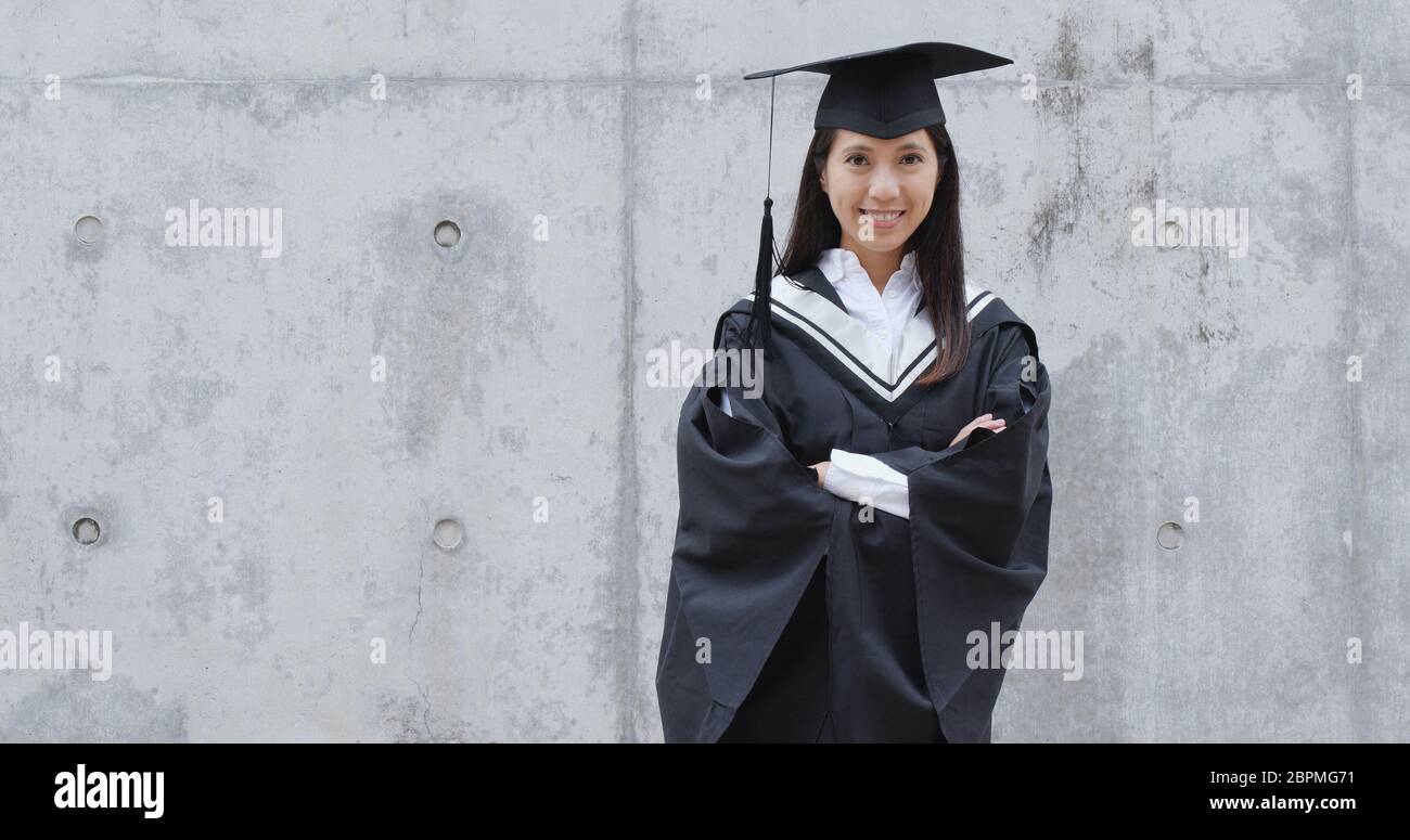 Asian young graduation arm cross Stock Photo - Alamy