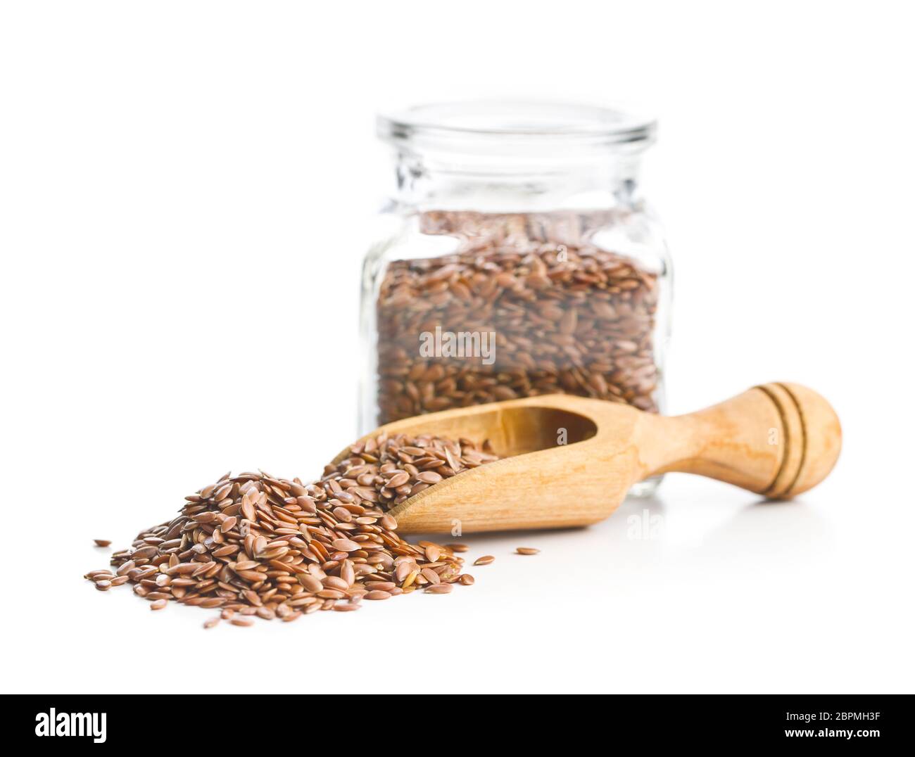 Flax seeds, linen seeds or linseeds in scoop isolated on white background Stock Photo - Alamy
