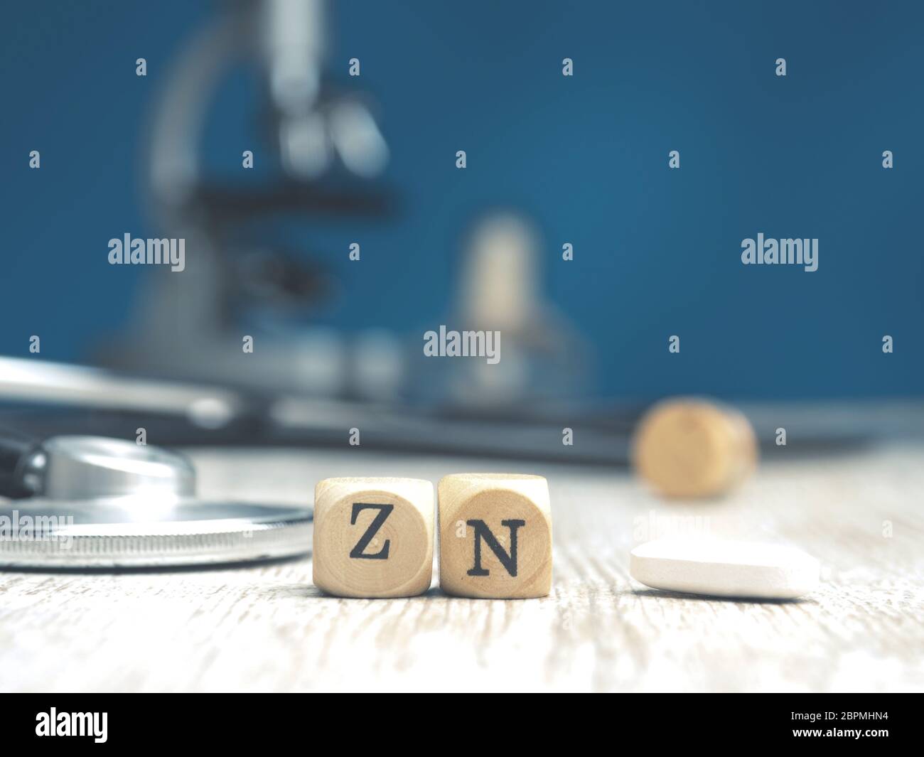 The periodic word zinc on small wooden blocks with a stethoscope on a ...