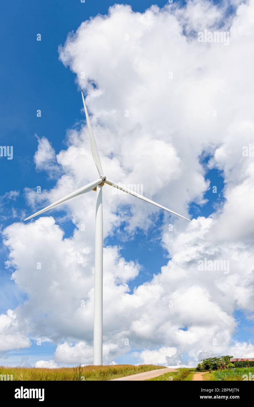 Beautiful one windmill on the hill with blue sky and white clouds ...