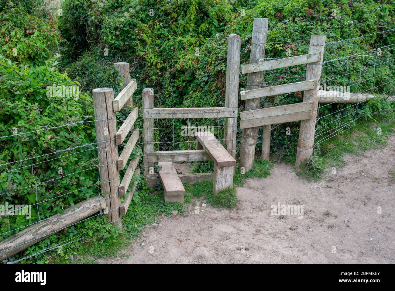 Steps over fence hi-res stock photography and images - Alamy